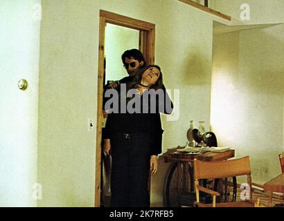 THE POSSESSION OF JOEL DELANEY, Perry King, (background, from left ...