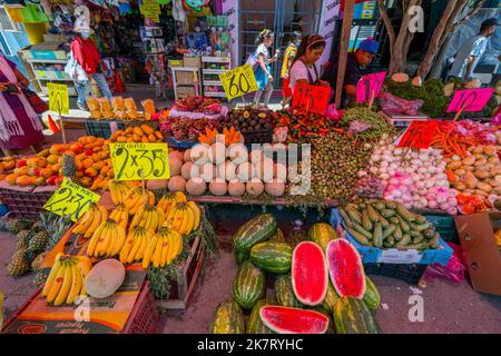 Produce stands on the weekly indigenous market in the small town of ...