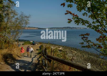Hikers coming up from the beach at Fort Townsend Historical State Park ...