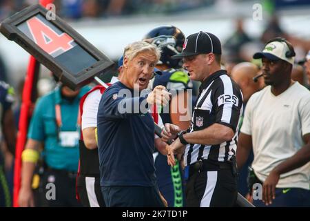 Side judge Chad Hill (125) waches an NFL football game between the Los ...