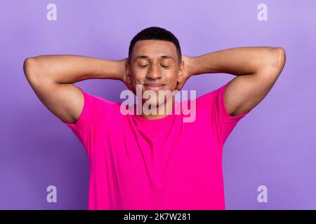 Portrait of optimistic satisfied man with fade haircut wear pink t ...