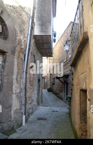Civitella D'agliano, VT, Italy. Narrow arched passageway serving as the ...
