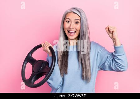 Photo of excited pretty lady dressed denim shirt looking empty space ...