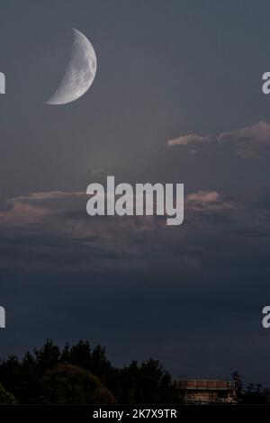 Sunset sky with large crescent moon, evening sky background Stock Photo ...