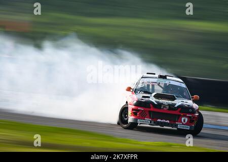 Drifting motorsport competition a spectacle all sideways, smoking tyres ...