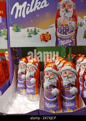 group of Milka chocolate Santa Claus figures in a supermarket Stock ...