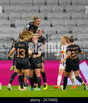 Arsenal players celebrate after Lyon goalkeeper Christiane Endler ...