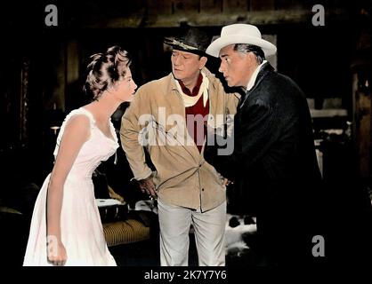 NORTH TO ALASKA John Wayne and Capucine Date: 1960 Stock Photo - Alamy