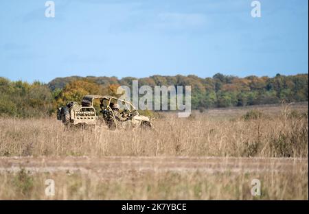 Polaris MRZR-D4 UTV (utility task vehicle) carrying soldiers from 40 ...