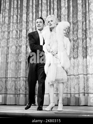 GENE KELLY and JEAN HAGEN as Don Lockwood and Lina Lamont at premiere ...