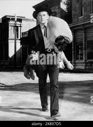 A still from the 1950s film *The Last Wagon*, starring Tommy Rettig ...