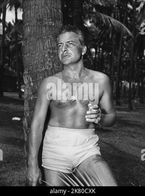 ROSSANO BRAZZI and Director JOSHUA LOGAN production candid checking ...
