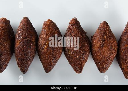 Roasted kibe. Traditional Brazilian snack Stock Photo - Alamy