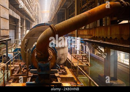 Huge grinding ball mill operates with mineral ore at plant Stock Photo ...