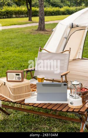 camping mood aesthetics beer and tablet pc Stock Photo - Alamy