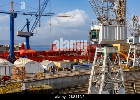 Harbor and the Bay of Gibraltar with its colorful rail cranes ...