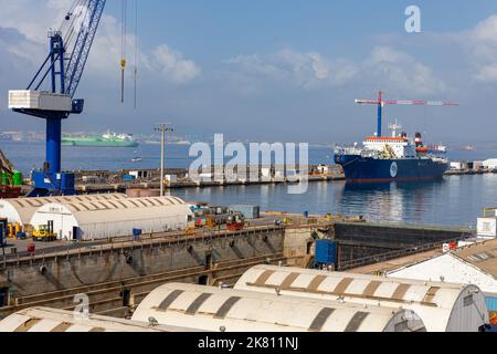 Harbor and the Bay of Gibraltar with its colorful rail cranes ...