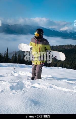 man snowboarder portrait carpathian mountains on background Stock Photo ...