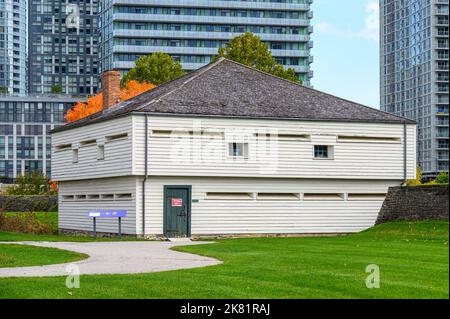 Colonial fortified wall buildings of the garrison contrast with the ...