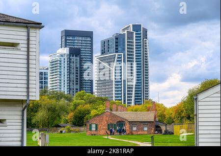 Colonial fortified wall buildings of the garrison contrast with the ...