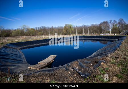 Insulated leachate pond with dirty water, part of landfill Stock Photo ...
