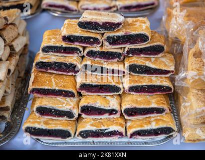 Poppy seed and cherry Hungarian Strudel (Rétes) in a street eatery ...