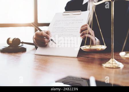 Discussing legal matters and signing important documents Stock Photo ...