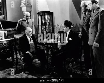 GEORGE RAFT and SYDNEY GREENSTREET in BACKGROUND TO DANGER 1943 ...