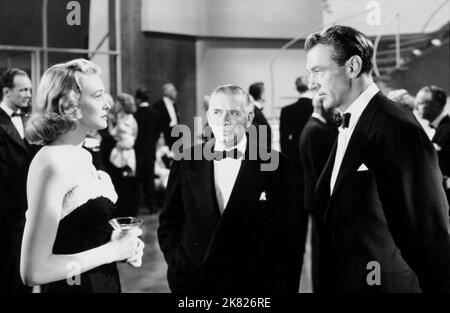 GARY COOPER as Howard Roark and PATRICIA NEAL as Dominique Francon in ...