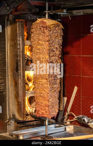 Turkish meat doner. Meat cooked in wood fire is doner. Traditional ...