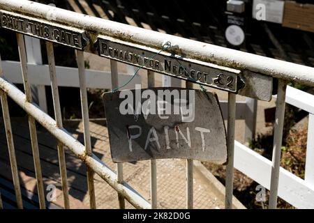 Home drawn sign on white board at food booth at outdoor market in ...