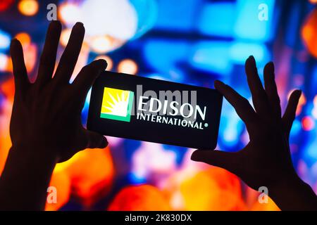 In this photo illustration an Edison International logo seen displayed ...