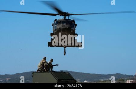 Senior Airmen Giancarlo Hernandez and John Millan-Irizarry, 51st ...