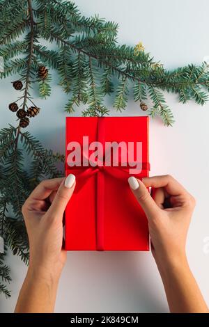 Evergreen tree present box on wooden board holiday concept Stock Photo ...