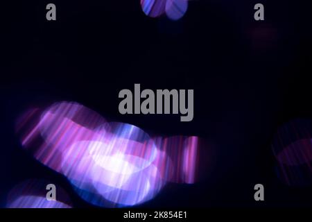 purple rainbow crystal light leaks on black background Stock Photo - Alamy