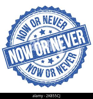 NOW OR NEVER text written on red round postal stamp sign Stock Photo ...