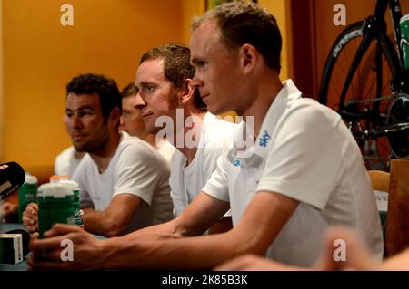 Chris Froome of Sky Procycling answers questions with outside his hotel ...