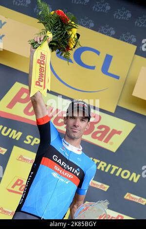 David Millar wins the stage and celebrates on the podium Stock Photo ...