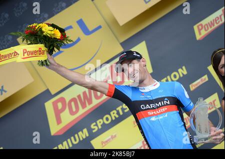 David Millar wins the stage and celebrates on the podium Stock Photo ...