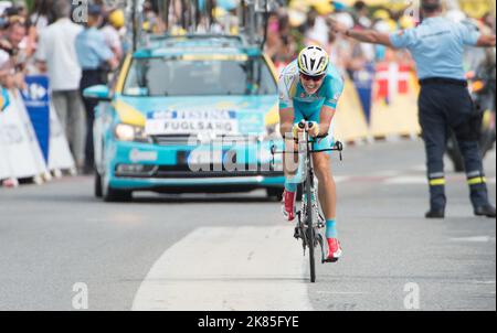 Jakob Fuglsang crosses the finish line in 38th position Stock Photo - Alamy