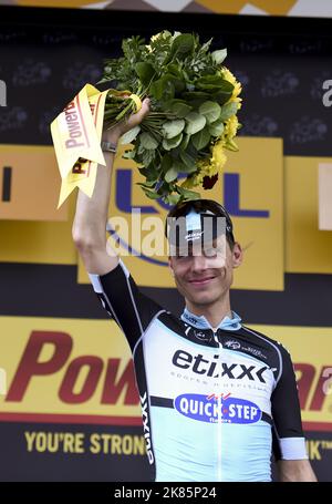 Tony Martin celebrates on the podium with his gold medal after winning ...