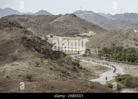 The peleton ride through the arid mountains of Jabal Al Akdhar in Oman ...