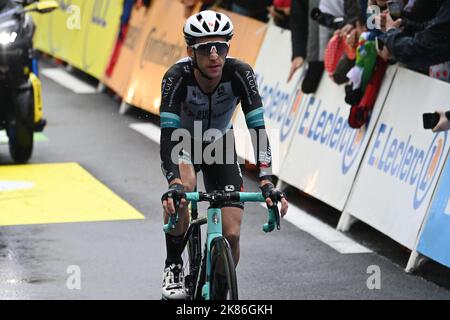 Britain's Simon Yates crosses the finish line to win the the tenth ...