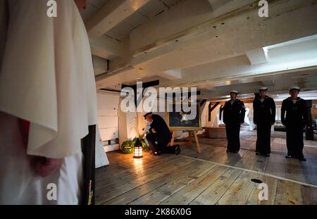 Commanding officer of HMS Victory Lieutenant Commander BJ Smith (left ...