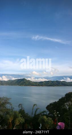 the amazing tondano lake surrounded by beautiful hills Stock Photo - Alamy
