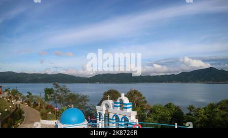 the amazing tondano lake surrounded by beautiful hills Stock Photo - Alamy