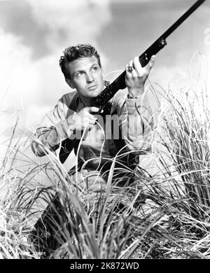 Robert Stack with skeet shooting rifle, 1940s Stock Photo - Alamy
