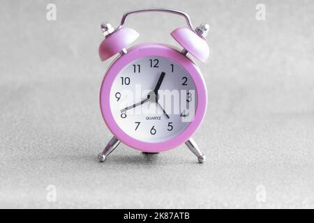 Isolated pink quartz alarm clock Stock Photo - Alamy