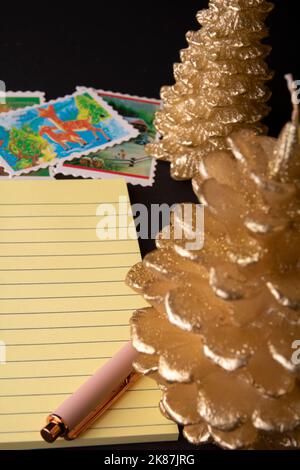 a notebook on the table with a candle Stock Photo - Alamy