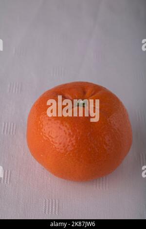 Empty white table with orange tangerine, figs and grape fruit . Healthy ...